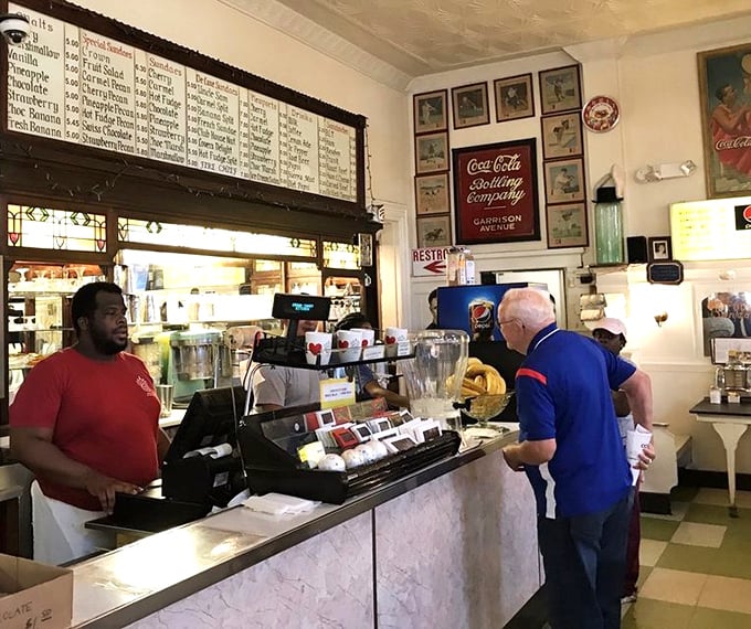 Where soda jerks are still respected professionals. The counter staff moves with the precision of orchestra conductors, creating symphonies in glassware.