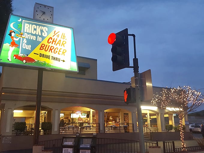 Rick's iconic sign glows against the twilight sky, a beacon for the burger-obsessed since long before Instagram food trends.