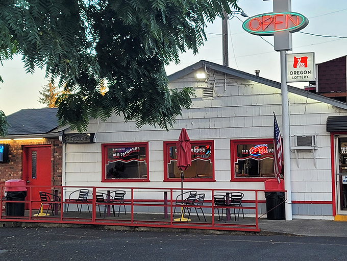 Even Oregon's fresh air tastes better with the promise of burgers. The outdoor seating area offers a front-row view of Main Street life.