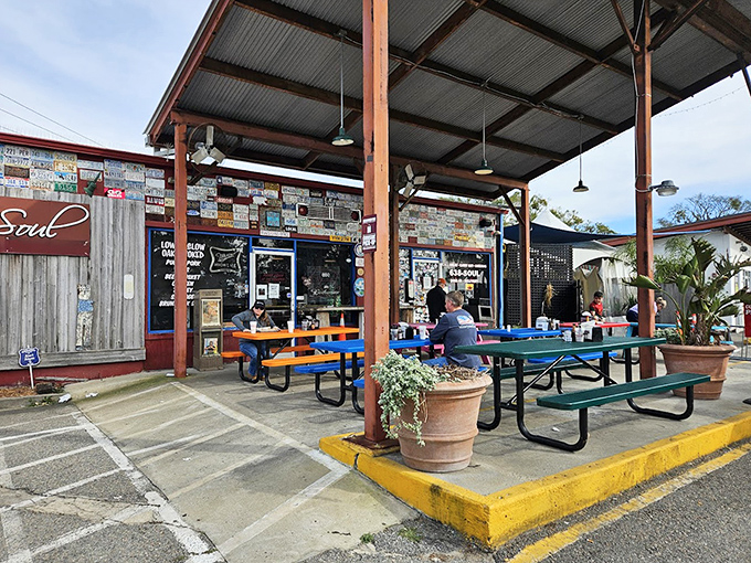 The covered patio offers respite from Georgia heat while you contemplate ordering seconds. Those colorful picnic tables have witnessed many barbecue epiphanies.
