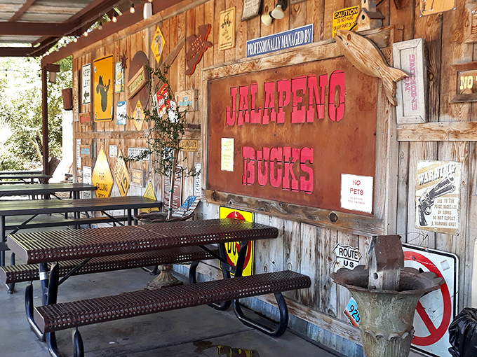 The outdoor dining area feels like your favorite uncle's back porch&mdash;if your uncle happened to be a barbecue genius with great taste in vintage signs.