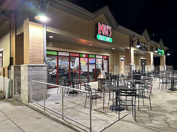 Nighttime transforms Rubi's patio into an urban oasis. Those empty chairs aren't just furniture&mdash;they're invitations to make memories over melted cheese.