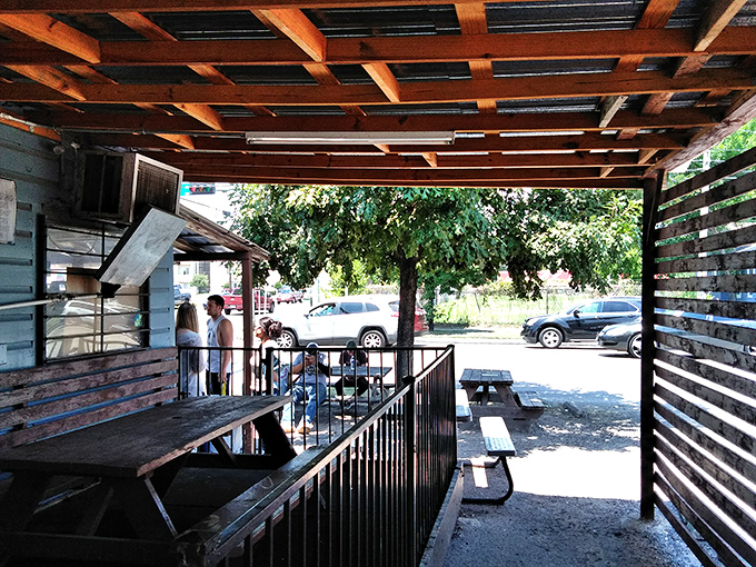 The covered patio: where shade, breeze, and burger appreciation come together in perfect harmony. Texas outdoor dining done right.