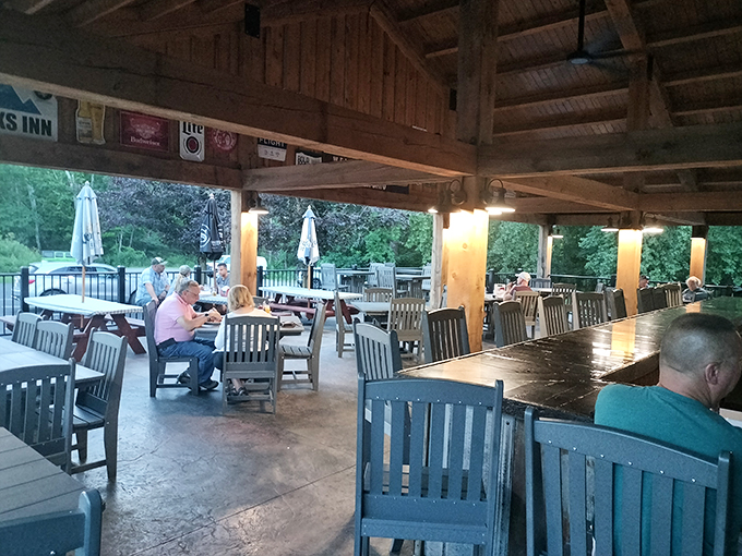 Summer evenings were made for dining al fresco under these rustic wooden beams and twinkling lights.