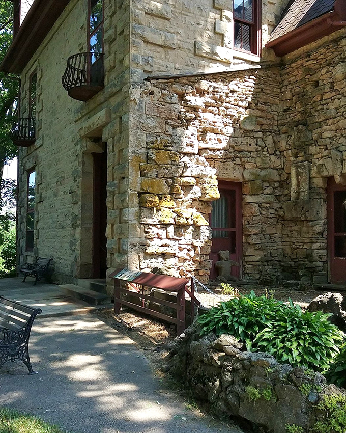 The exterior stonework shows the remarkable craftsmanship of 19th-century masons who built structures meant to last longer than most modern marriages.