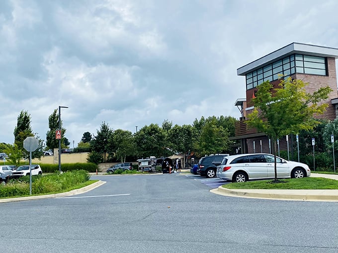 The spacious parking area promises room for everyone's shopping haul, though you might need breadcrumbs to remember where you parked after hours of retail therapy.