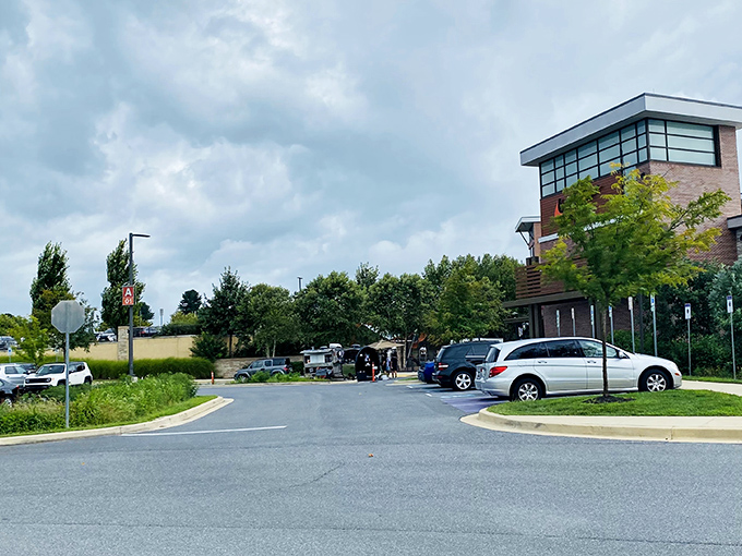 The spacious parking area promises room for everyone's shopping haul, though you might need breadcrumbs to remember where you parked after hours of retail therapy.