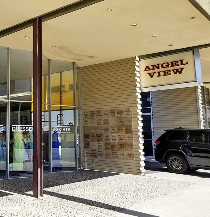 The storefront's clean lines and mid-century vibe fit perfectly into Palm Springs' architectural landscape. Thrift shopping with desert mountain views!