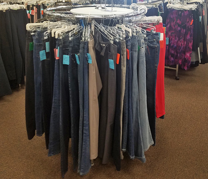 The circular rack of denim possibilities—where your next favorite jeans are playing hard to get among their blue brethren.