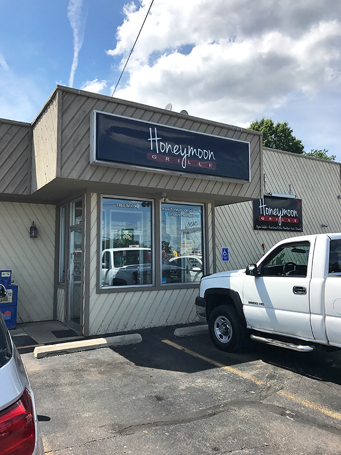 A patron enjoying the fruits of Honeymoon Grille's labor. That smile says everything words cannot.
