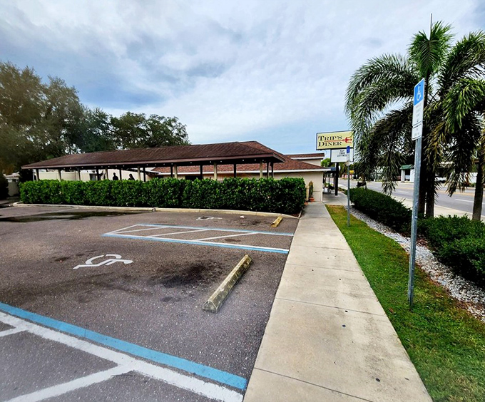 The parking lot might not look special, but it's where hunger arrives and satisfaction departs. Those palm trees add that essential Florida touch.