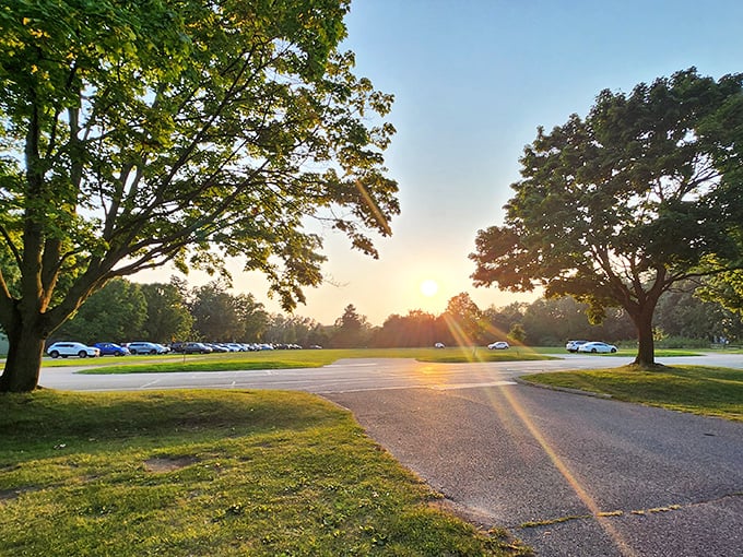 The golden hour transforms Huntington's parking lot into a scene worthy of a nostalgic summer film&mdash;where every car holds stories of beach days.