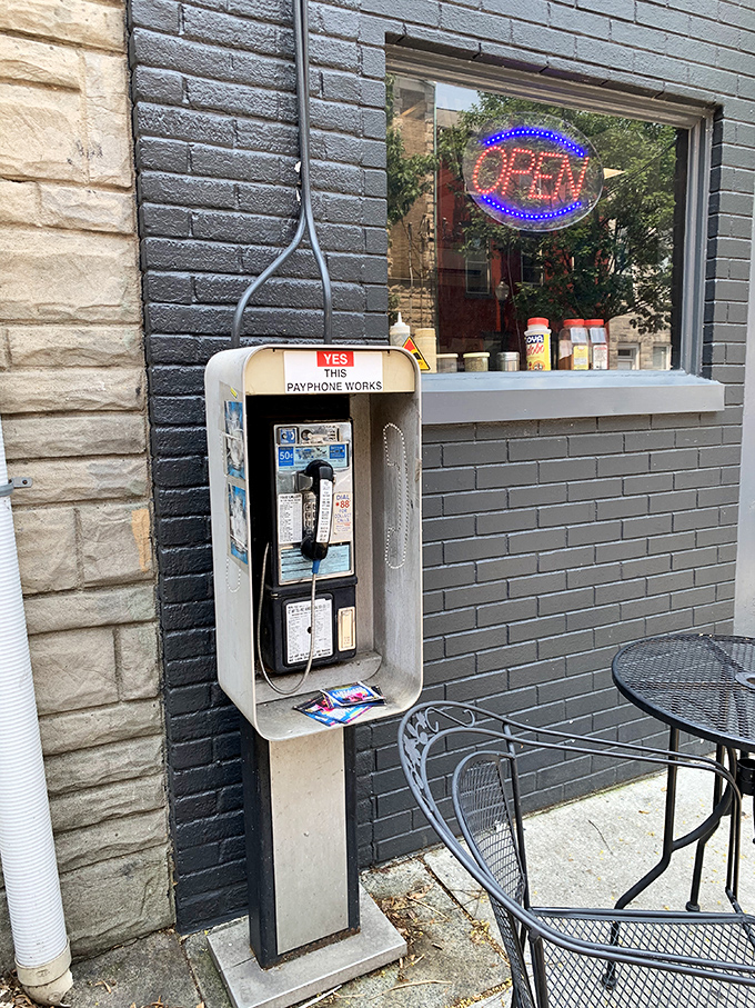 The last working payphone in America stands guard outside Speed's &ndash; call everyone you know and tell them about your cheesesteak discovery.