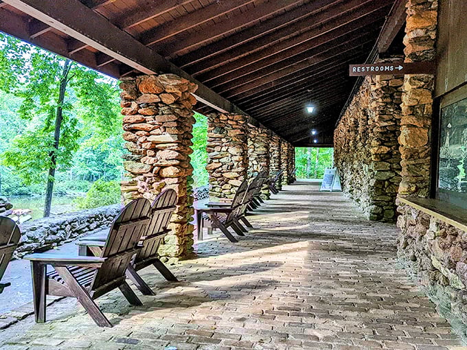 Adirondack chairs line this stone porch, practically begging you to sit a spell and remember what relaxation felt like before smartphones.