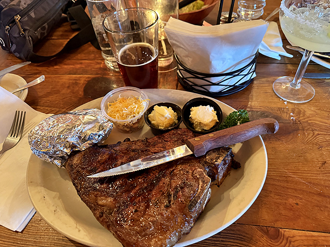 A steak knife standing at attention&mdash;ready for the task at hand. This impressive cut with all the fixings is Arizona dining at its most authentic.