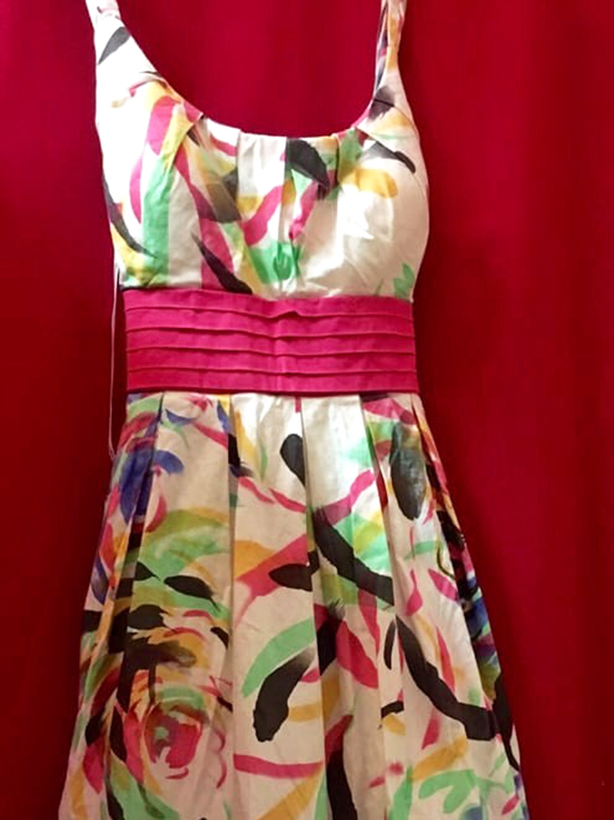 A splash of watercolor florals on crisp fabric&mdash;this dress is summer incarnate. Someone's impulse buy becomes your signature piece.