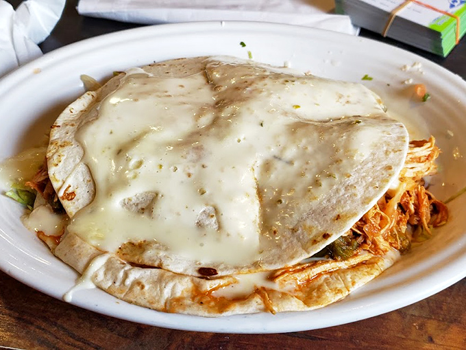 This quesadilla isn't messing around&mdash;melted cheese blankets tender meat between perfectly crisped tortillas in a dish that defines comfort food.