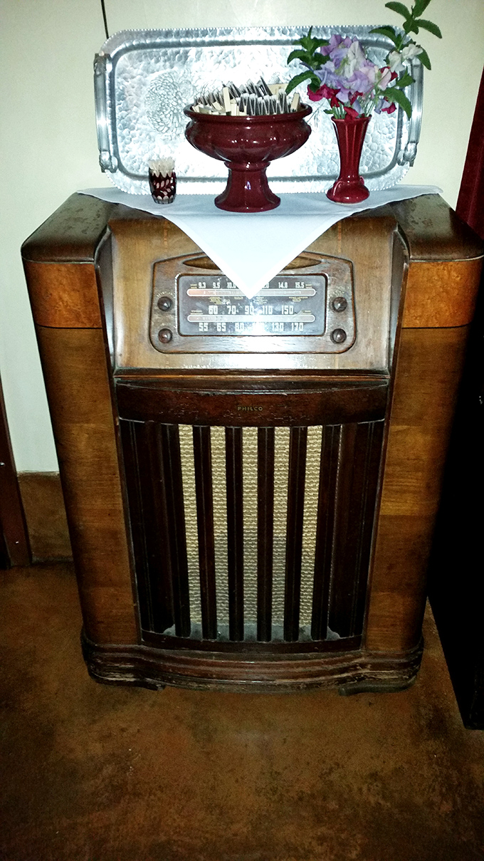 Vintage charm extends to every detail &ndash; this antique radio isn't just decoration; it's a time machine to when dining was an unhurried pleasure.