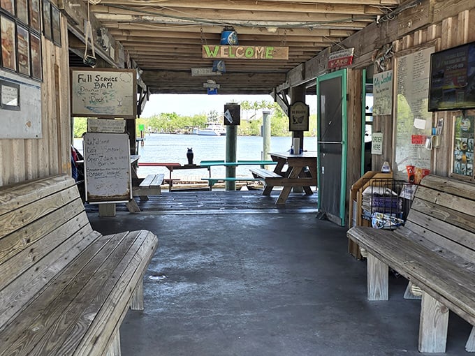 The pathway to happiness is sometimes a simple wooden walkway with bench seating and a view of the water.