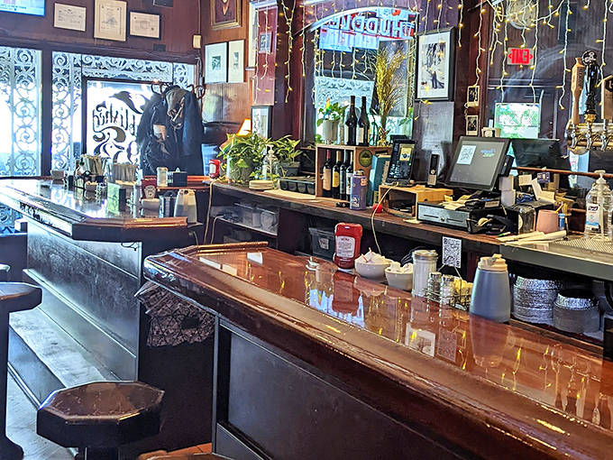 A classic register area that says "we take cash and credit, but payment in compliments also accepted."