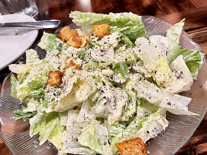 A Caesar salad that respects tradition&mdash;crisp romaine, sharp dressing, and croutons that actually taste like something.