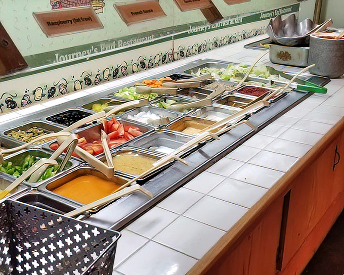 The salad bar stretches like a colorful highway of fresh options&mdash;the starting line for a buffet marathon where pace yourself is the winning strategy.
