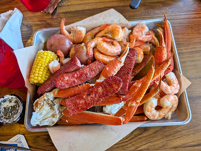 A seafood boil that's basically a treasure chest of the ocean's best offerings. Those crab legs are practically begging you to roll up your sleeves.