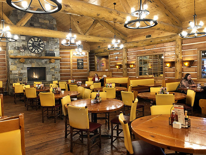 The dining room's lodge aesthetic continues, with a stone fireplace ready for those chilly Meridian mornings.