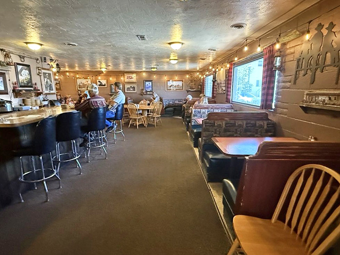 The dining room's warm wood tones and booth seating create the perfect backdrop for both family celebrations and quiet solo meals.