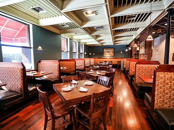 Warm wood tones, patterned booths, and just the right lighting create that rare dining room where you want to linger long after the plates are cleared.