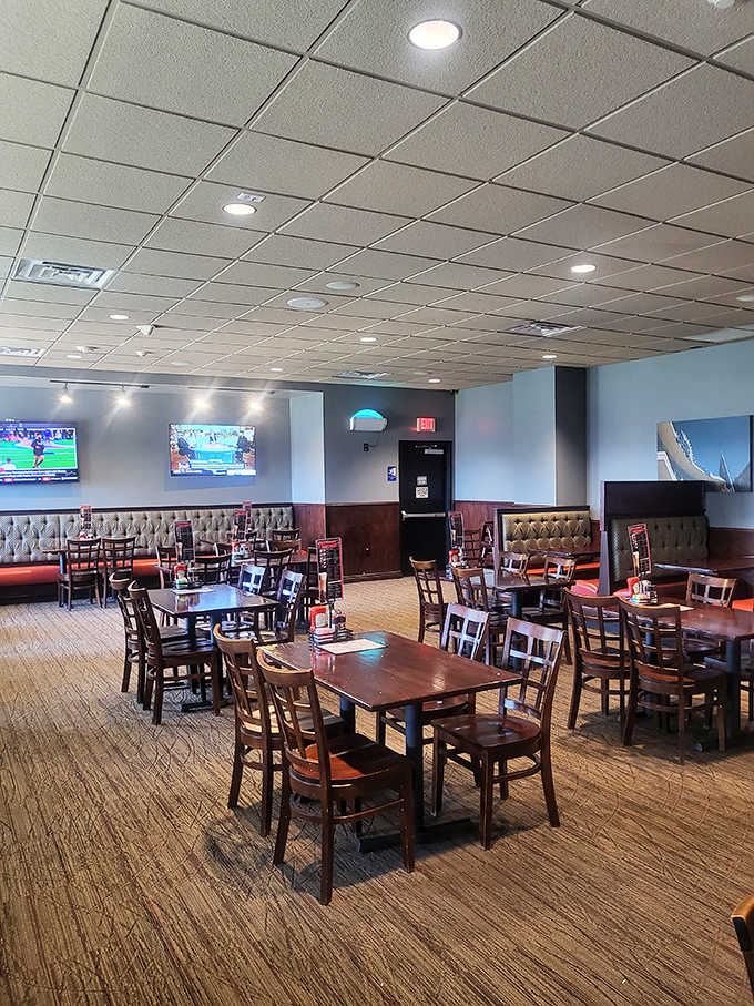 A dining room designed for lingering conversations and second cups of coffee. Those wooden chairs have heard more local gossip than any therapist in town.