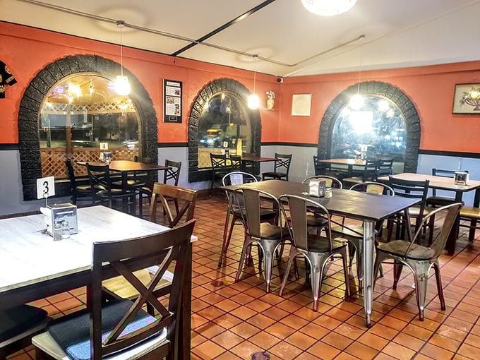 The dining room's simple elegance lets the food be the star. Those terra cotta walls and arched windows create an atmosphere of casual sophistication.