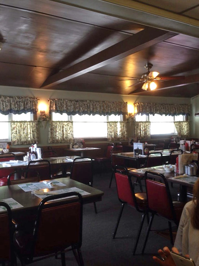 Orange booths that have witnessed more conversations and celebrations than a therapist's office could ever imagine.