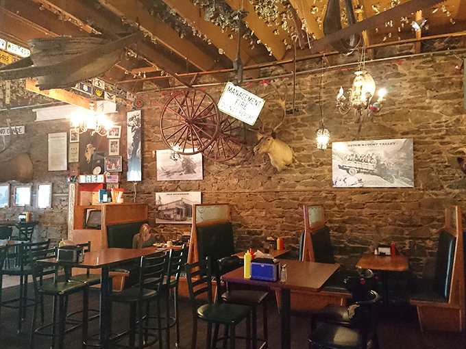 Cozy booth seating with vintage touches creates the perfect atmosphere for lingering over exceptional comfort food and great company.