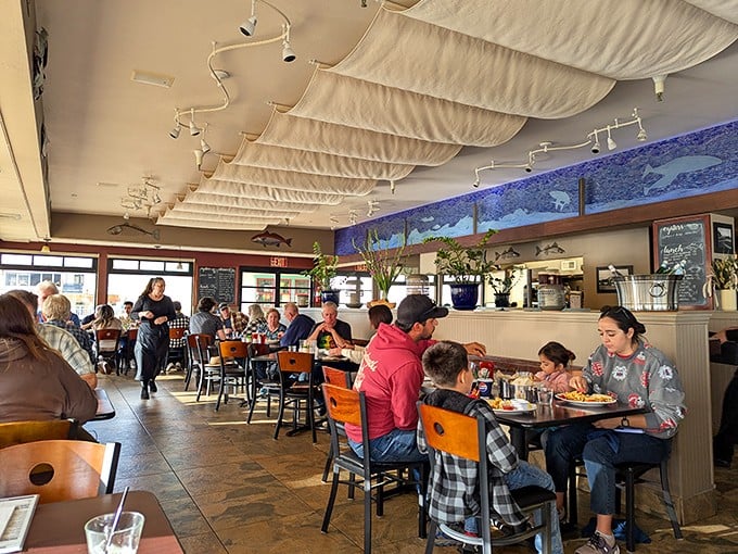 A dining room where families and food lovers gather, proving great seafood is the universal language everyone understands.