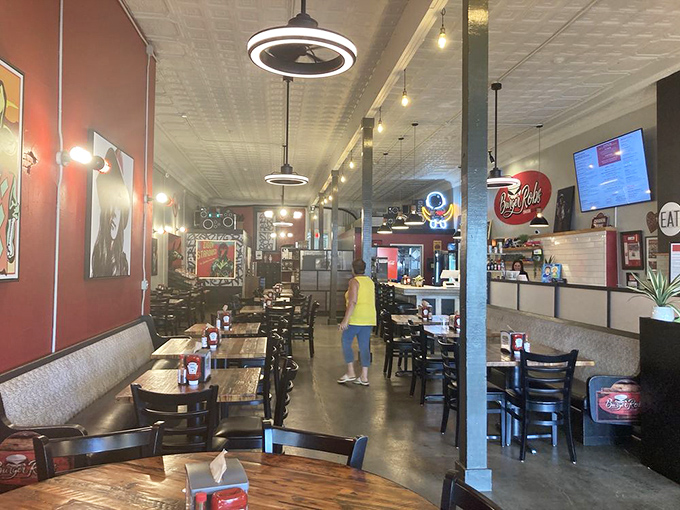 The dining room balances casual comfort with subtle style, where every table becomes the stage for a performance of pure eating pleasure.