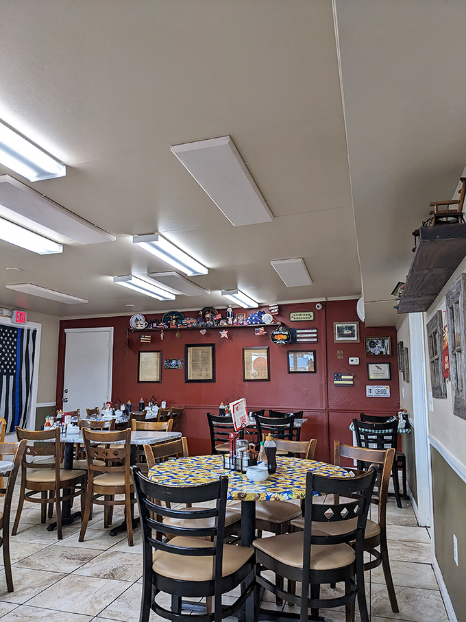 The dining room where breakfast magic happens. Red walls adorned with local memorabilia create the perfect backdrop for morning feasting.