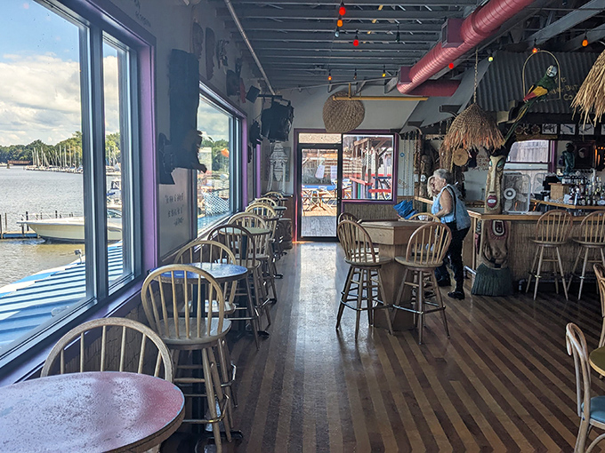 Riverside seating offers views of the Grand River, where boats drift by as you contemplate another round of crab legs.