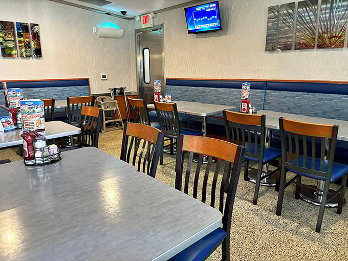 Tables await the next wave of hungry patrons in this dining room where countless birthday celebrations and post-game meals have unfolded.