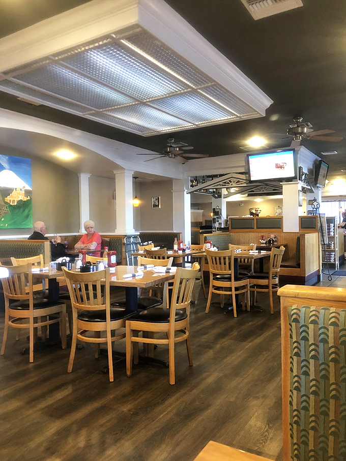 Tables spaced just right&mdash;close enough to feel the community vibe, far enough apart for private conversations about who's getting the last bite.