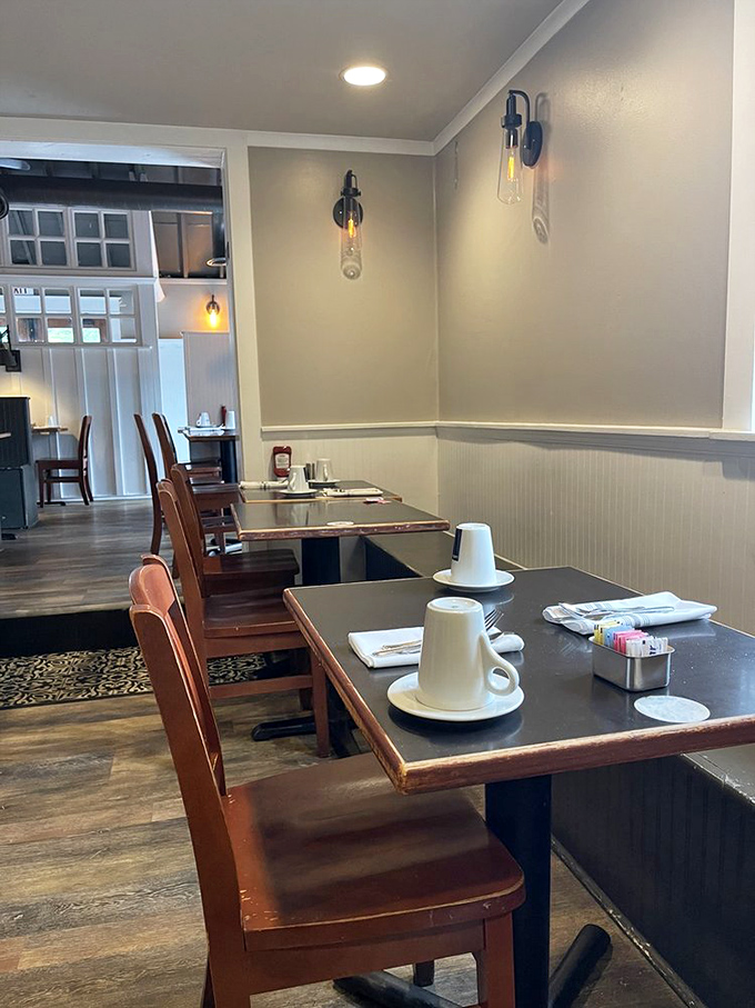 Clean lines, warm wood, and thoughtful lighting create the perfect backdrop for morning conversations that matter&mdash;or comfortable silence with coffee.