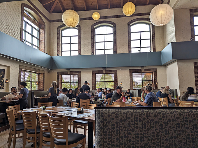 High ceilings, paper lanterns, and natural light create a dining room that feels both spacious and intimate &ndash; like eating in a stylish friend's great room. 