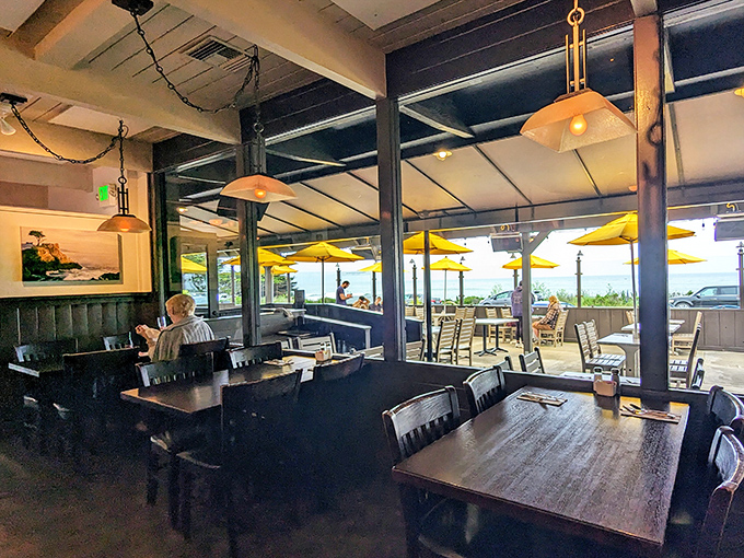 Dining rooms designed for both conversation and contemplation. Yellow umbrellas outside add California sunshine even on foggy coastal days.