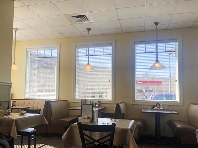 Sunlight streams through windows onto comfortable booths &ndash; nature's way of highlighting where your next food memory is about to be made.