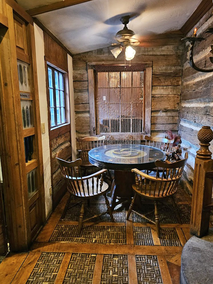 This intimate dining alcove makes every meal feel like a special occasion. The wooden chairs practically whisper, "Stay awhile, dessert is worth it."
