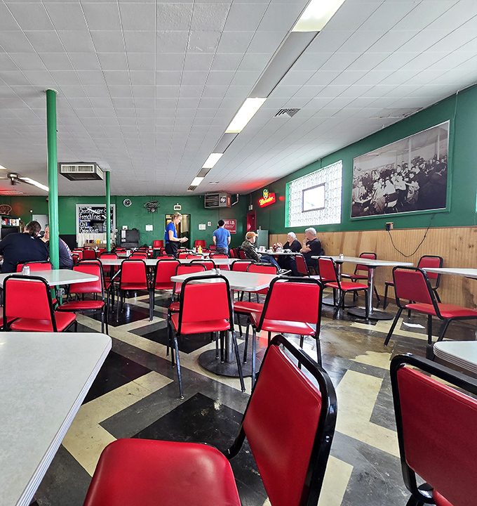The checkerboard floor and red chairs have witnessed decades of first dates, business deals, and regular folks just needing a great burger fix.
