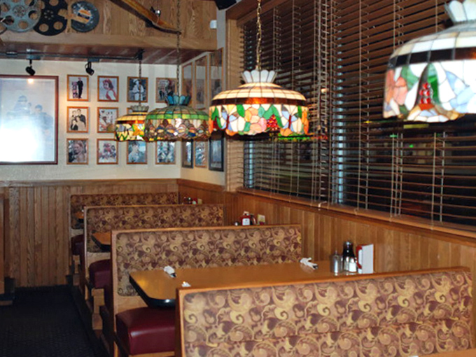 Tiffany-style lamps cast a warm glow over booths that have witnessed countless first dates, family celebrations, and Sunday morning recovery missions.