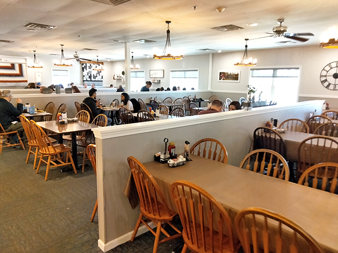 Divided dining areas create cozy nooks for serious eating business. Those dividers have witnessed more food joy than most marriage proposals.