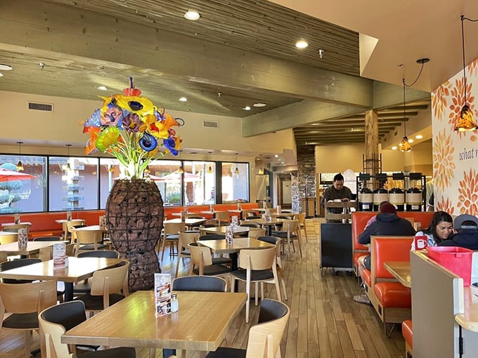 The interior's thoughtful design balances earthy elements with pops of color&mdash;like the desert itself after a spring rain. That glass sculpture demands attention.