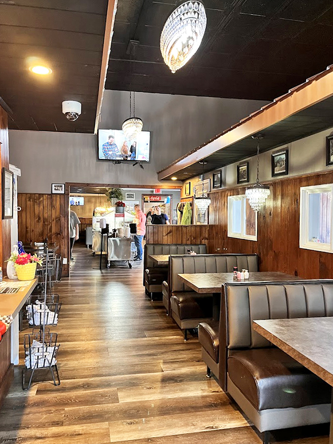 Cozy booths and simple tables create that perfect small-town restaurant vibe where both regulars and first-timers feel equally at home.